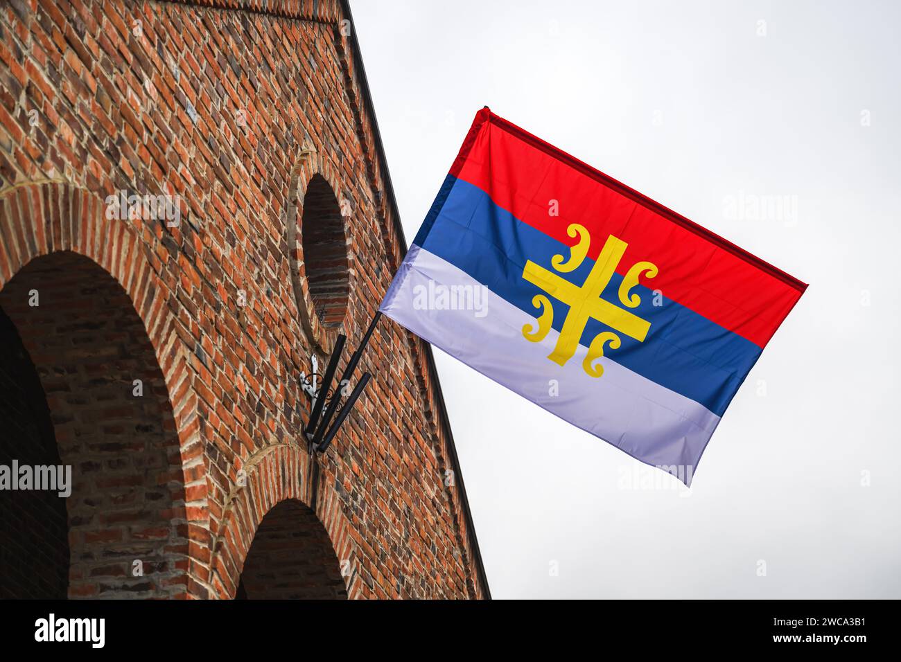 Serbian orthodox church flag with serbian cross 4S symbol, low angle ...