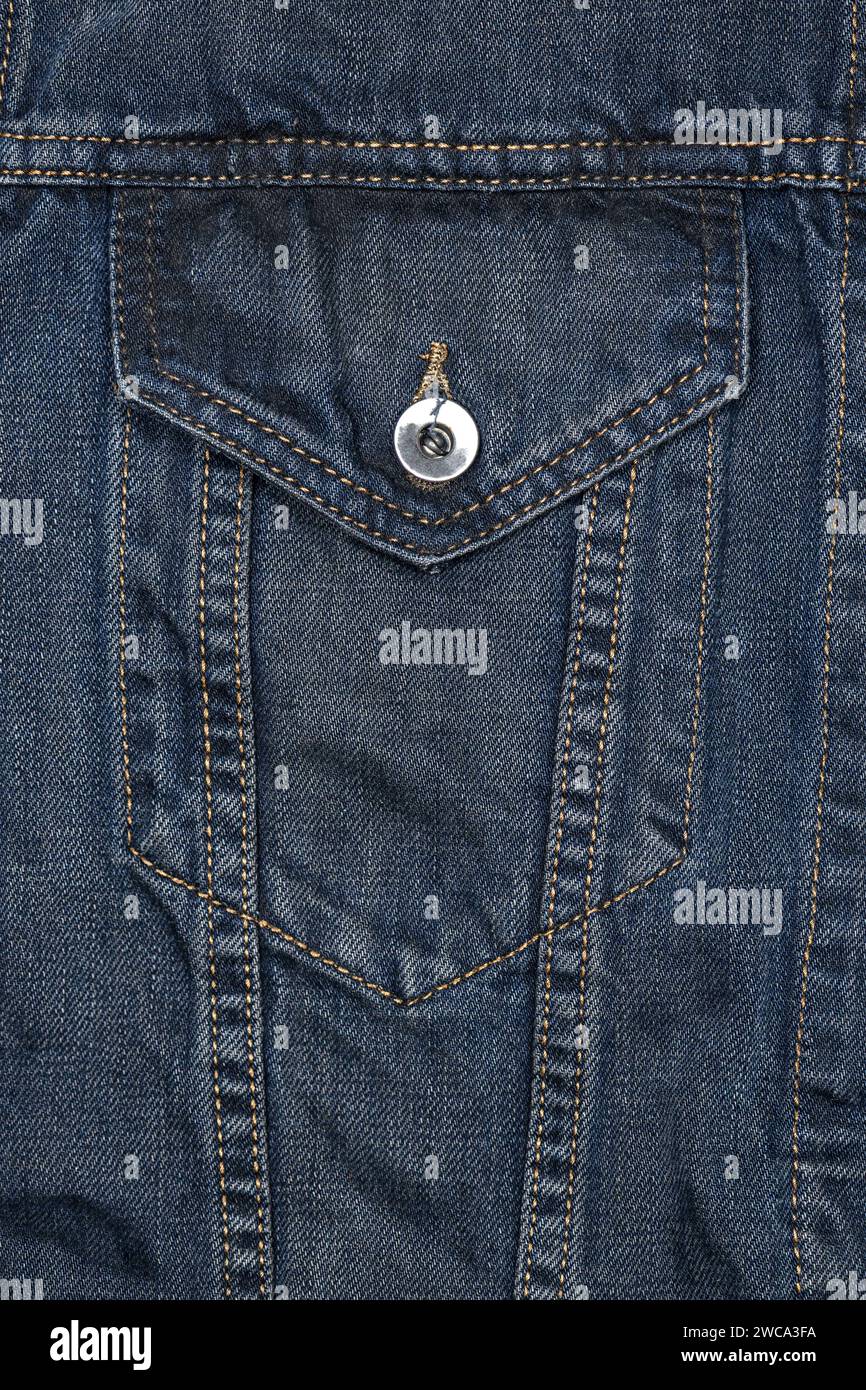 Jeans jacket pocket with metallic button, fashion and clothing Stock ...