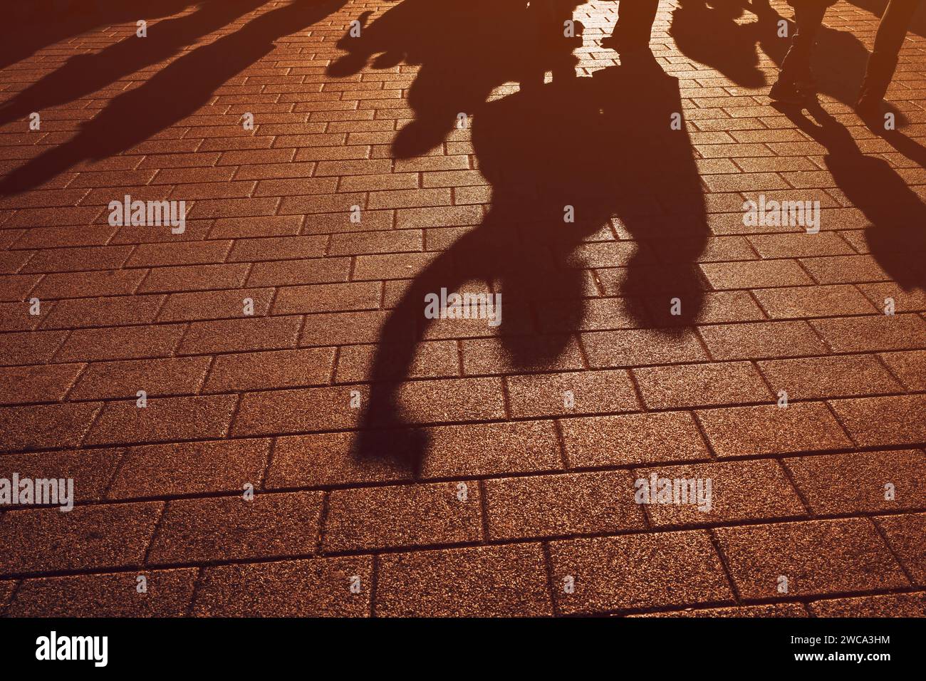 Shadow of people on sidewalk pavement, two people making selfie photo ...
