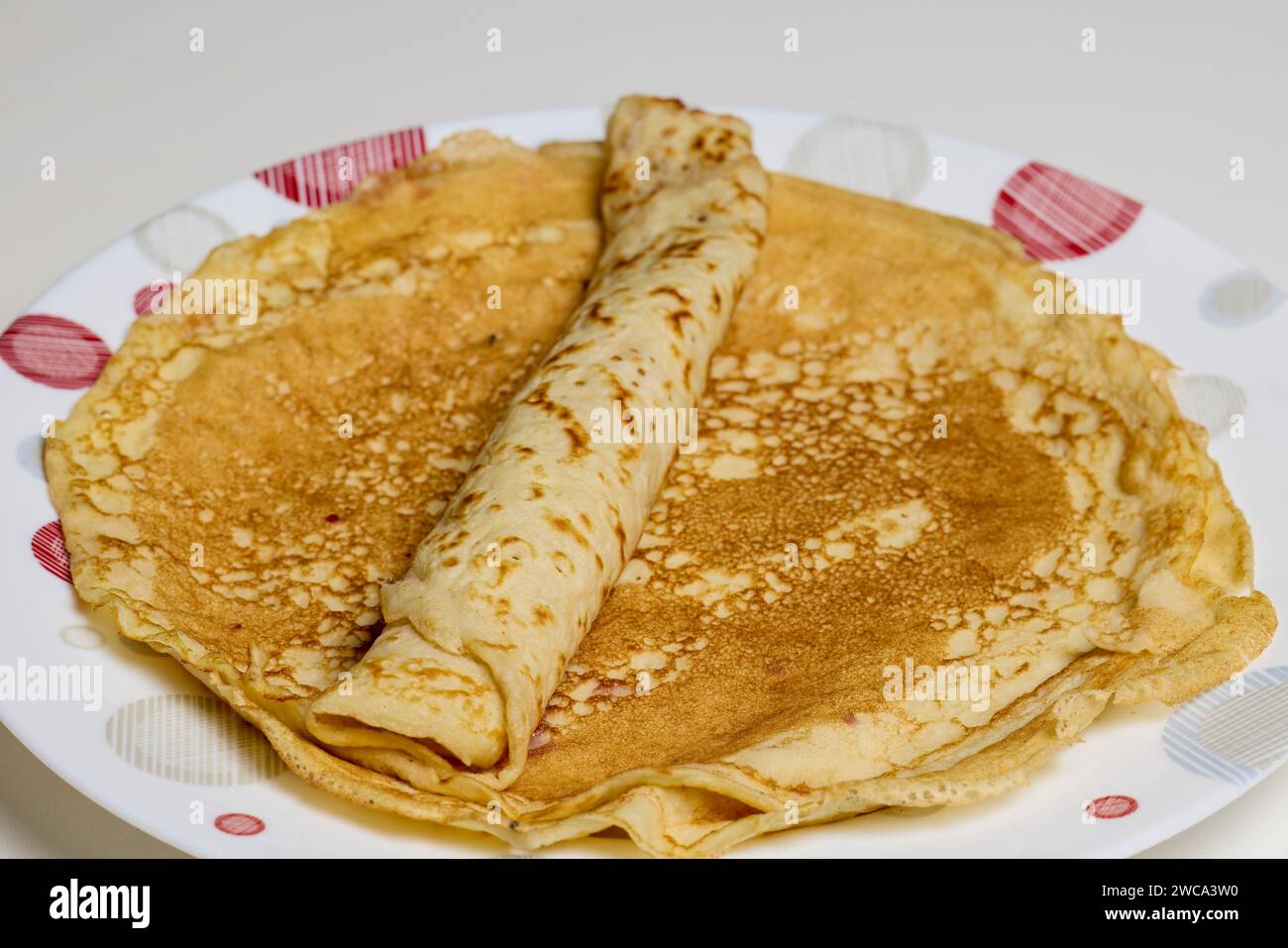 Traditional Romanian pancakes prepared to be eaten with different types ...