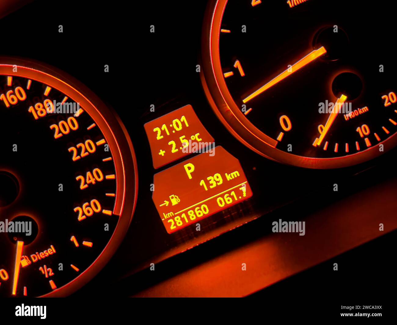 Illuminated car dashboard with a striking red backlight Stock Photo - Alamy