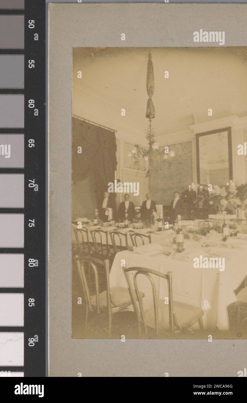 Four waiters posing behind a set table, anonymous, c. 1900 - c. 1930 ...