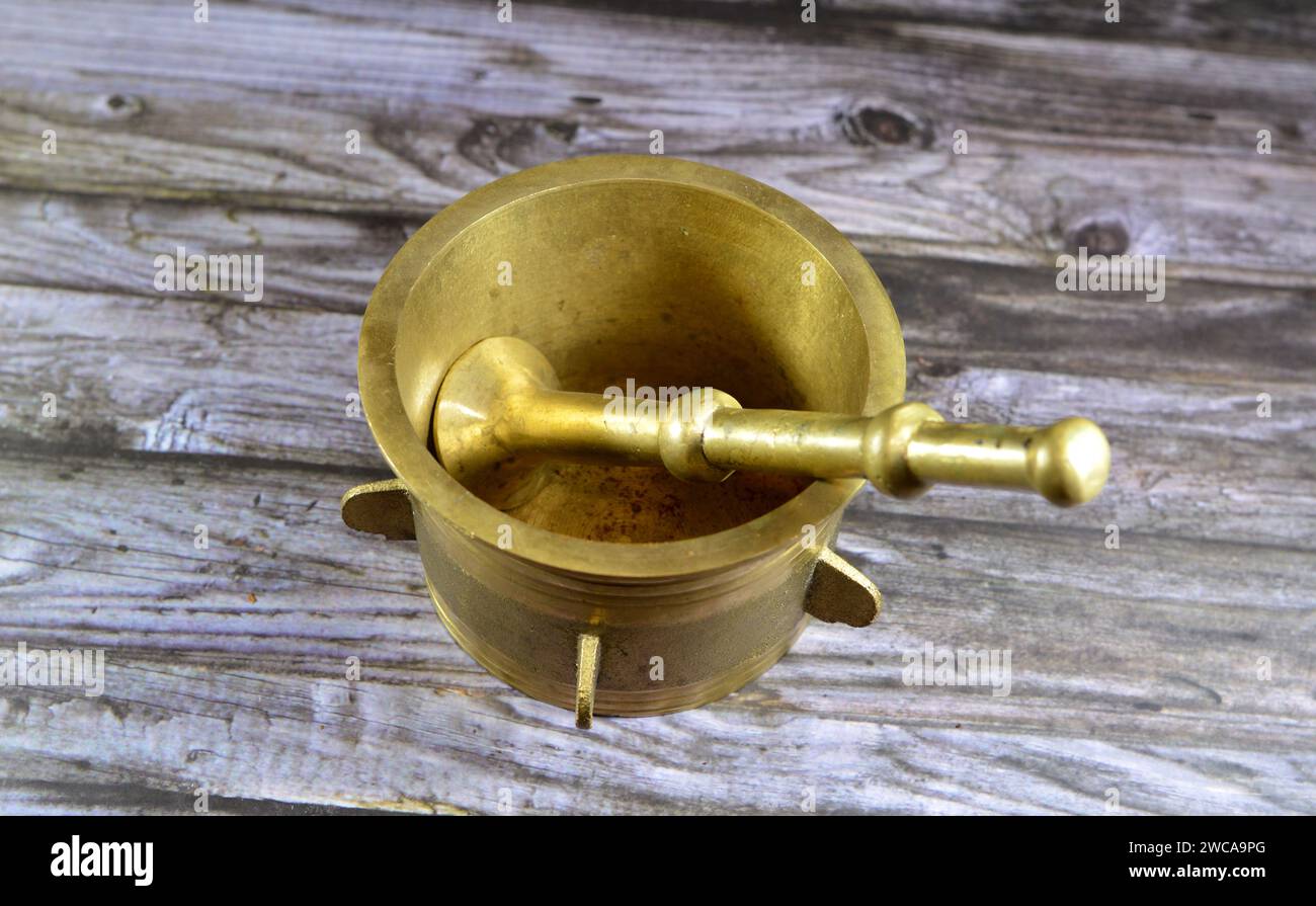 Antique brass copper mortar and pestle, used to prepare ingredients or ...