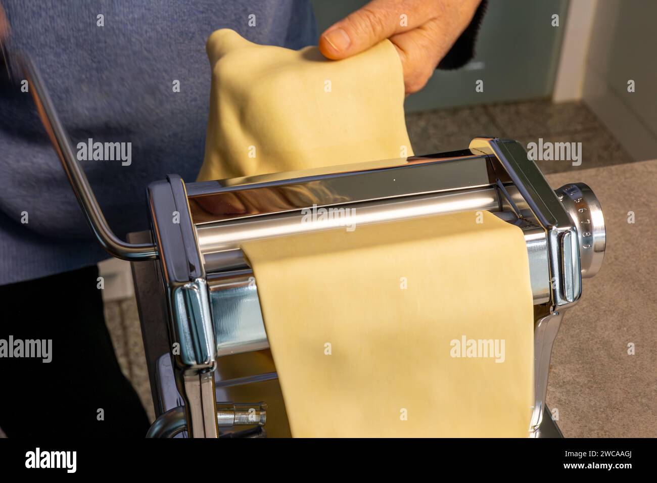Production of homemade pasta - italian noodles in diy - Close-up of ...