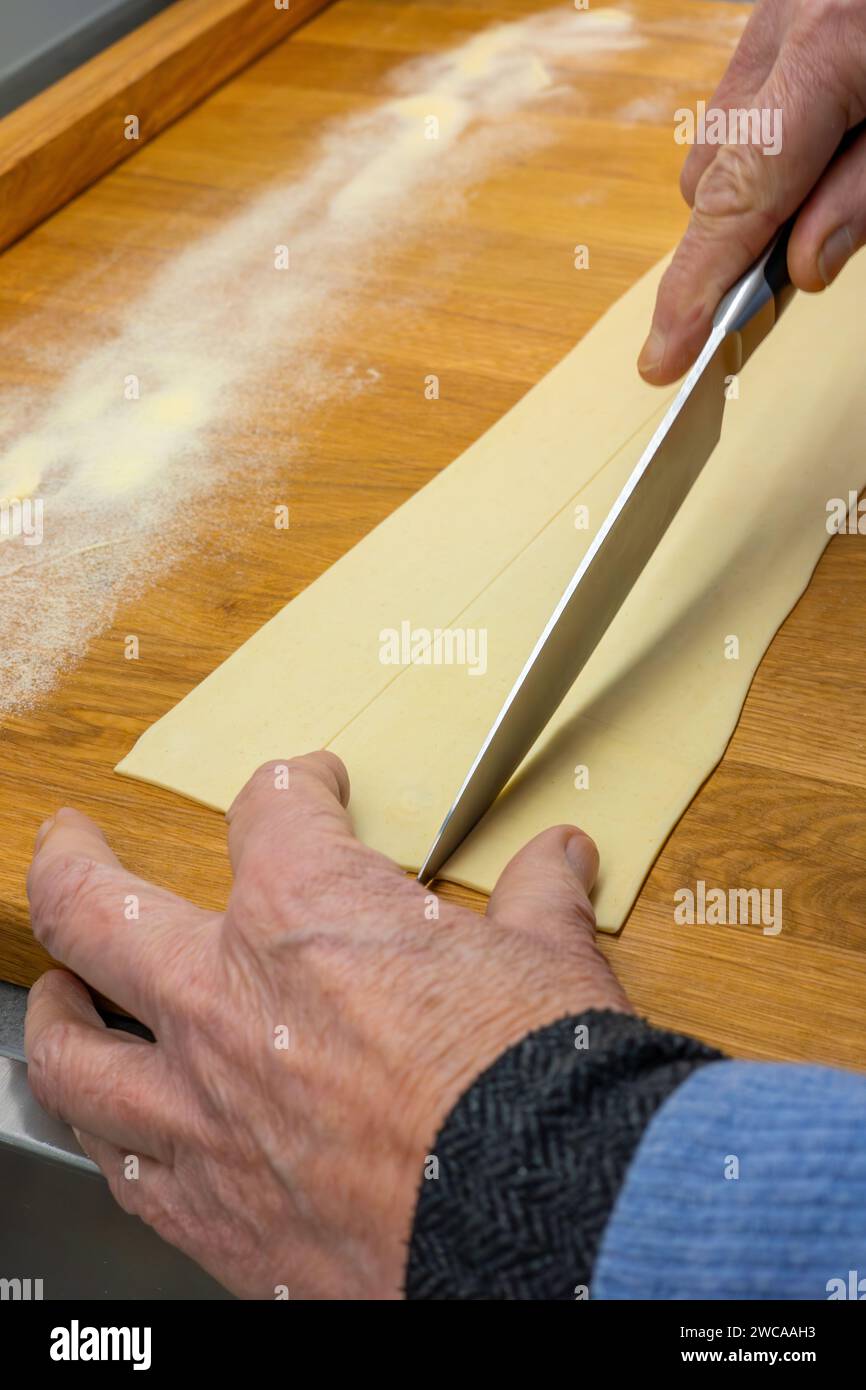 Production of homemade pasta - italian noodles in diy - Close-up of ...