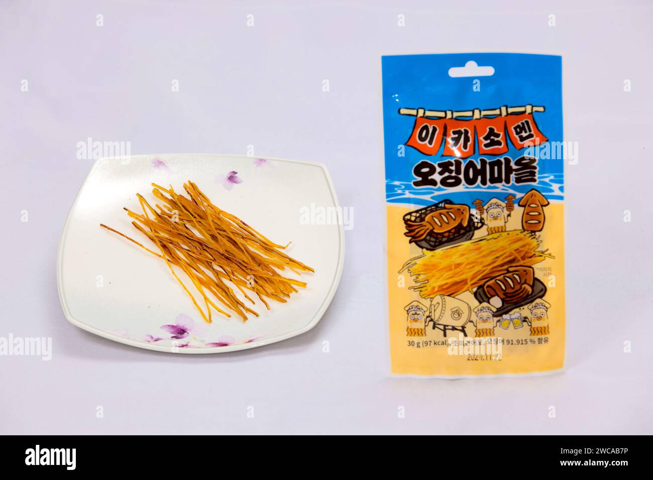 Ulsan, South Korea - January 14, 2024: A display of dried squid in long ...