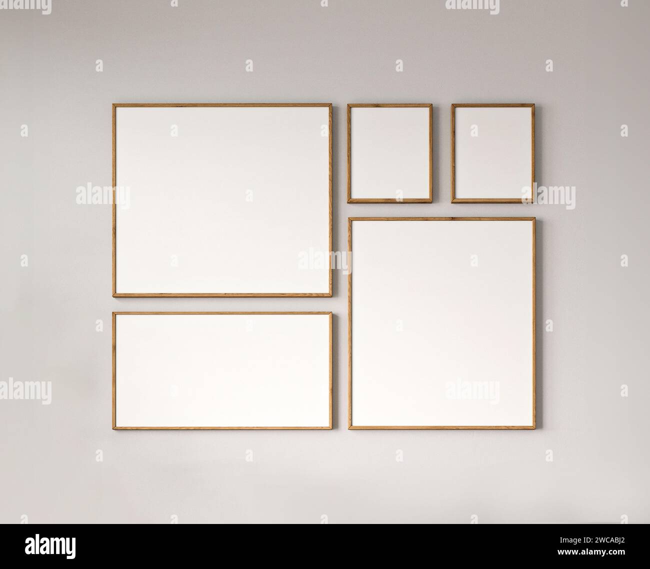 Modern gallery wall with a collection of empty picture frames on a ...