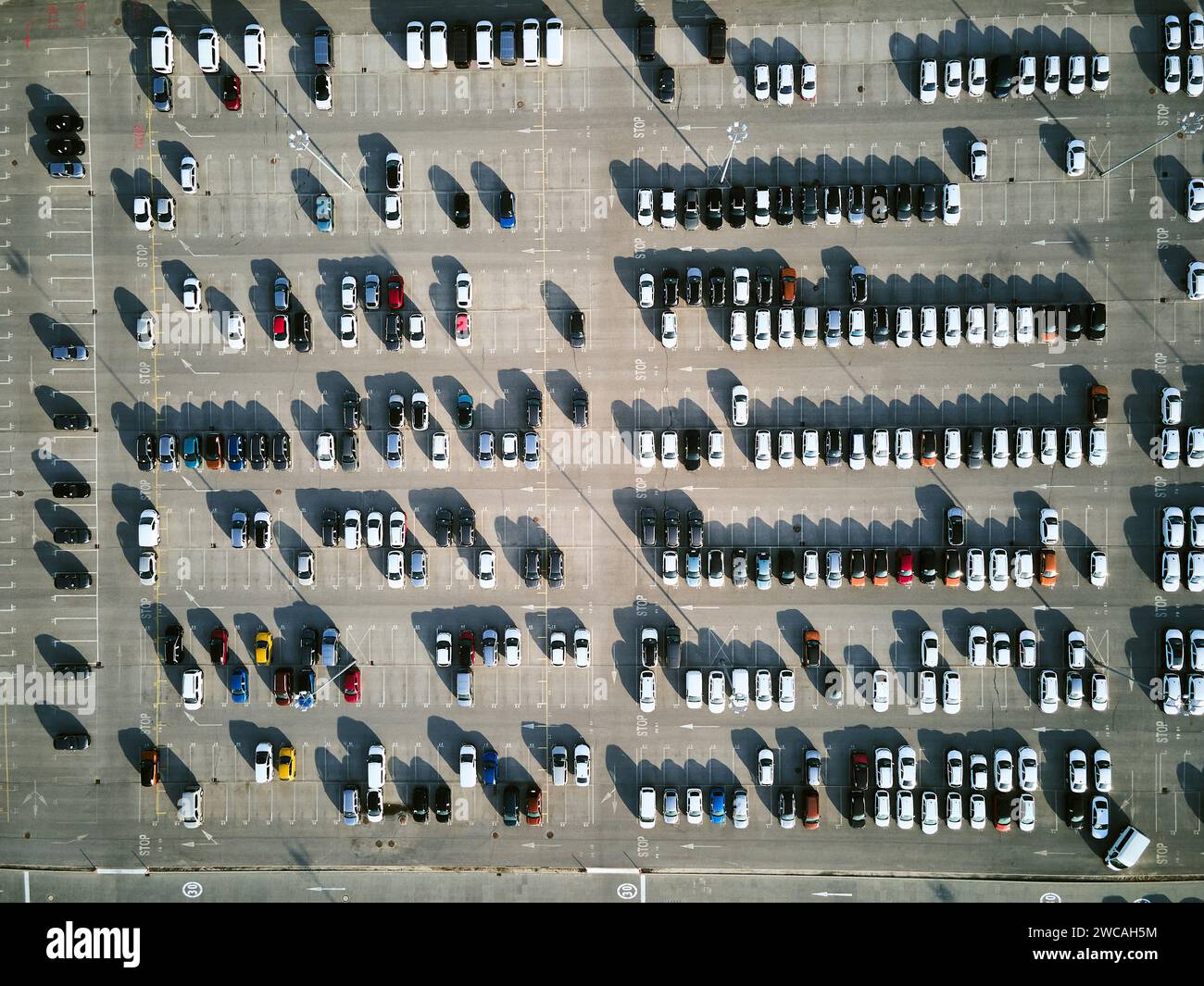 Aerial view of a massive parking lot at a car manufacturing facility ...