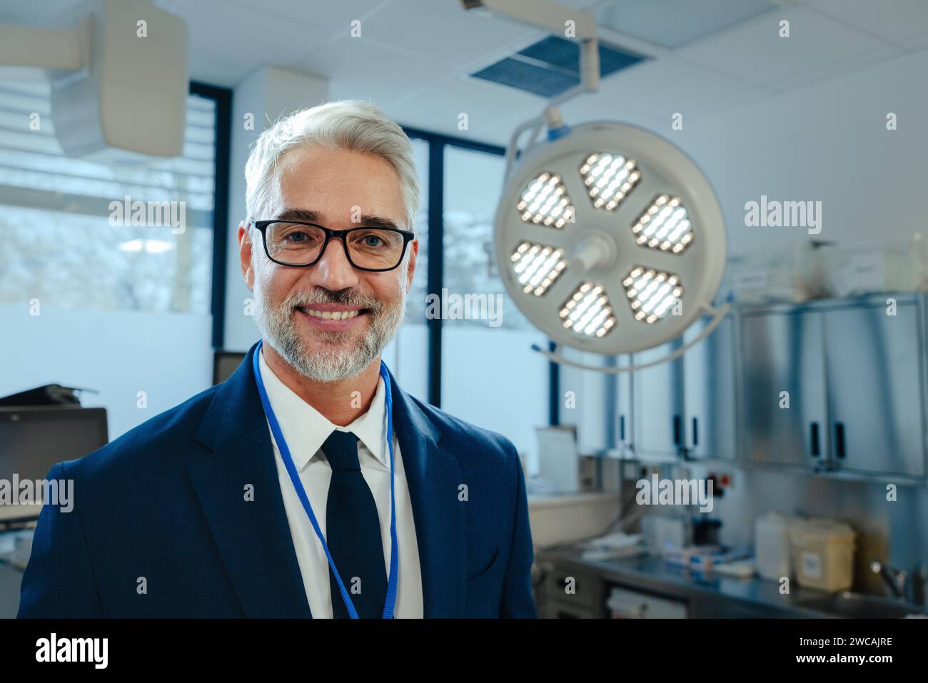 Portrait of pharmaceutical sales representative in medical building ...