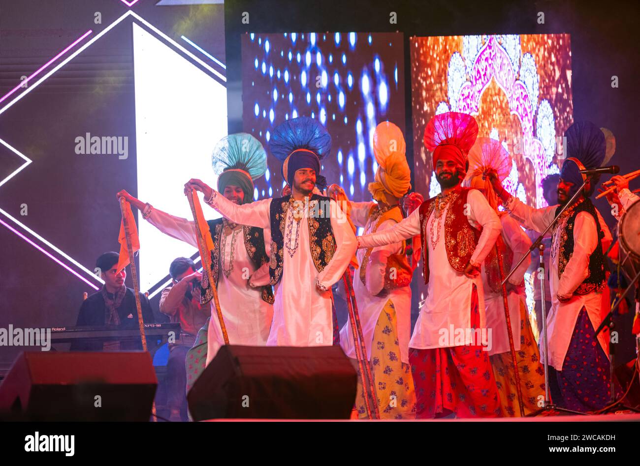 Group of punjabi artists from punjab performing bhangra dance in ...