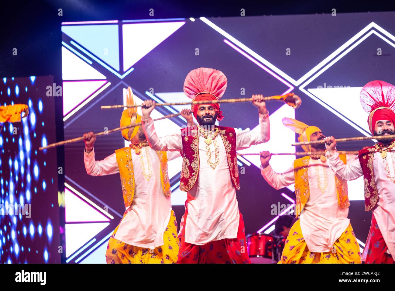 Group of punjabi artists from punjab performing bhangra dance in ...
