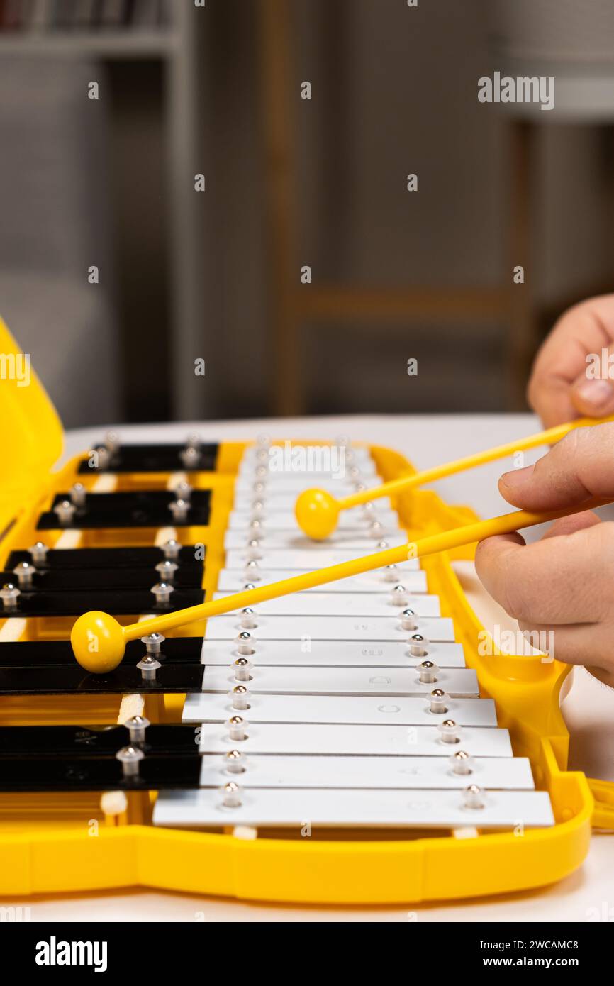 Playing sticks on metallophone hi-res stock photography and images - Alamy