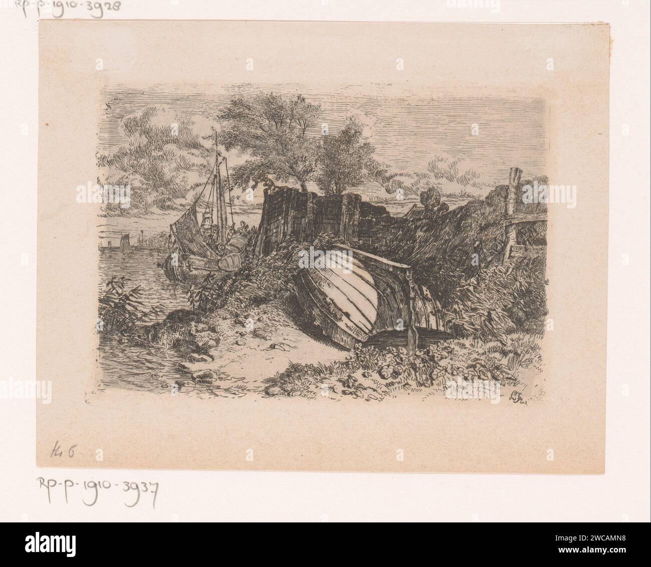 Rowing boat upside down on the shore with a sailing boat with hoisted ...