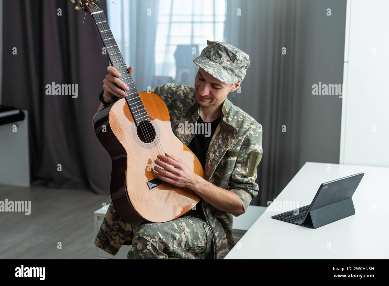 Veteran Guitar Play Concept. Family Meeting. Camouflage Uniform ...