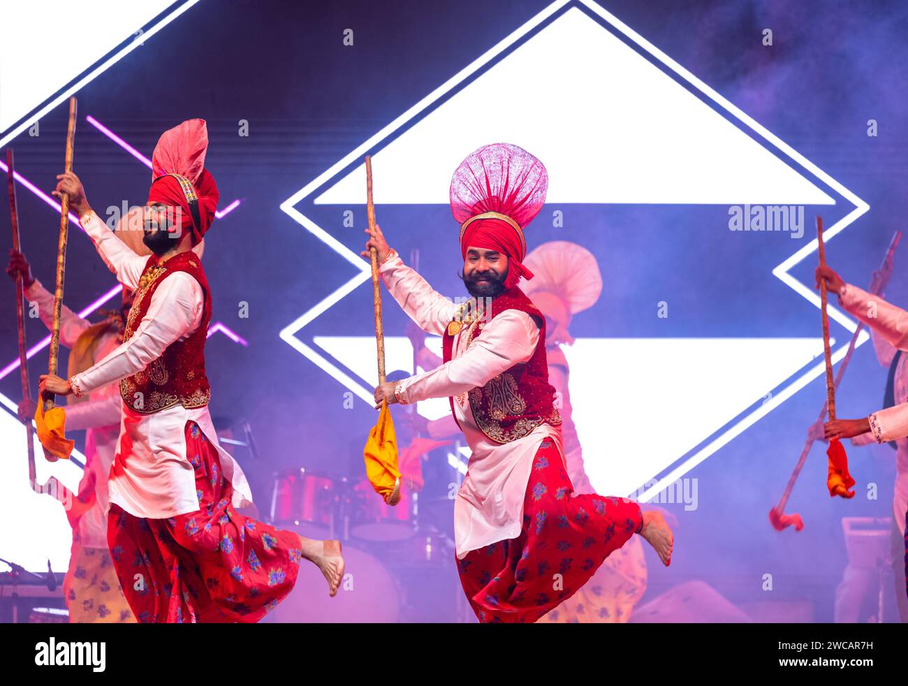Group of punjabi artists from punjab performing bhangra dance in ...