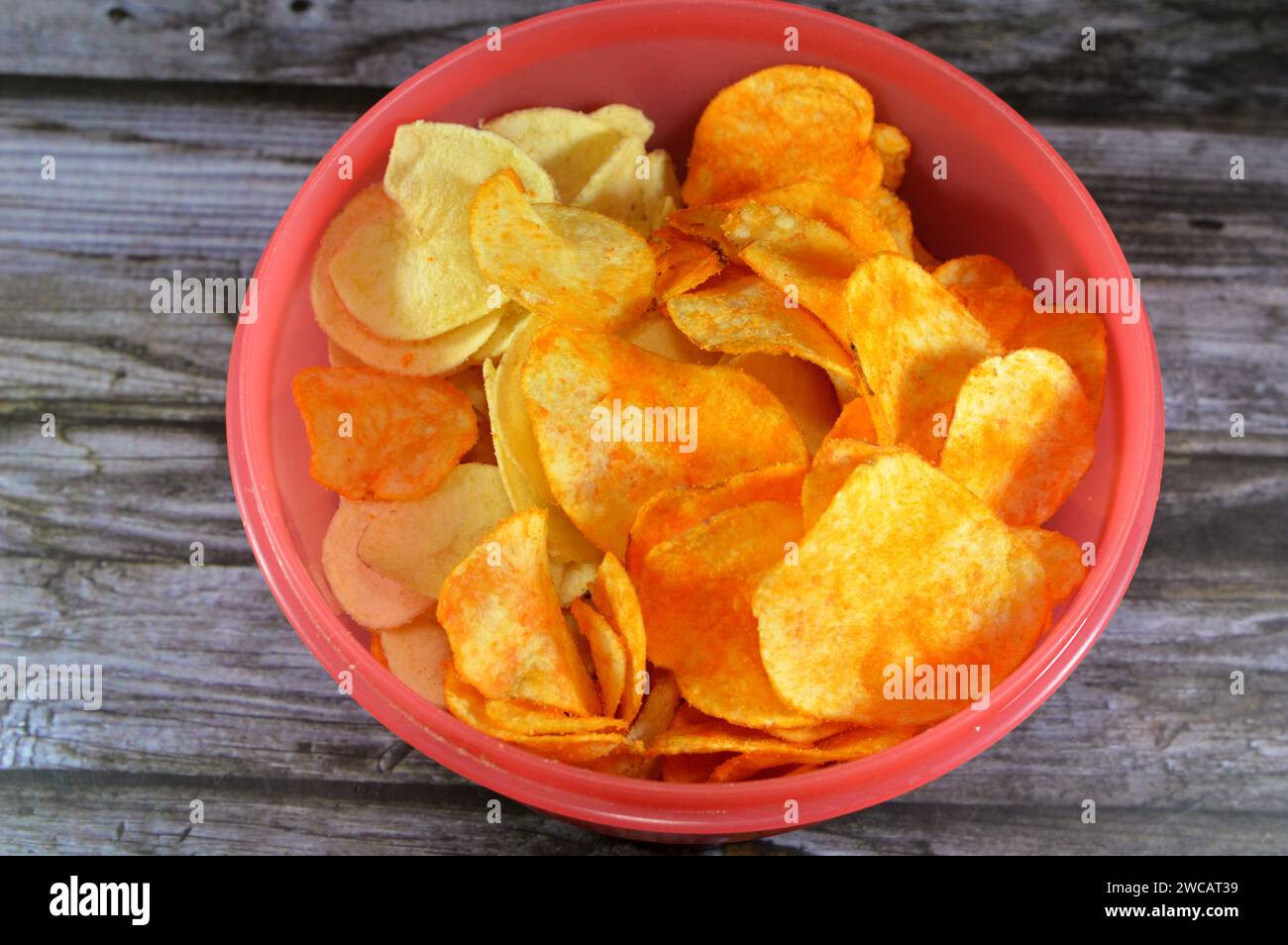Potato chips, crisps, thin slices of potato, deep fried, baked, or air ...