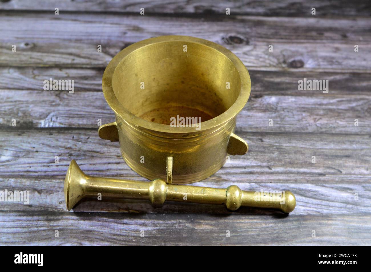 Antique brass copper mortar and pestle, used to prepare ingredients or ...