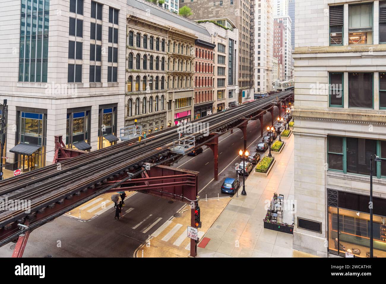 Elevated rail tracks lined with traditional architecture in Chicago ...