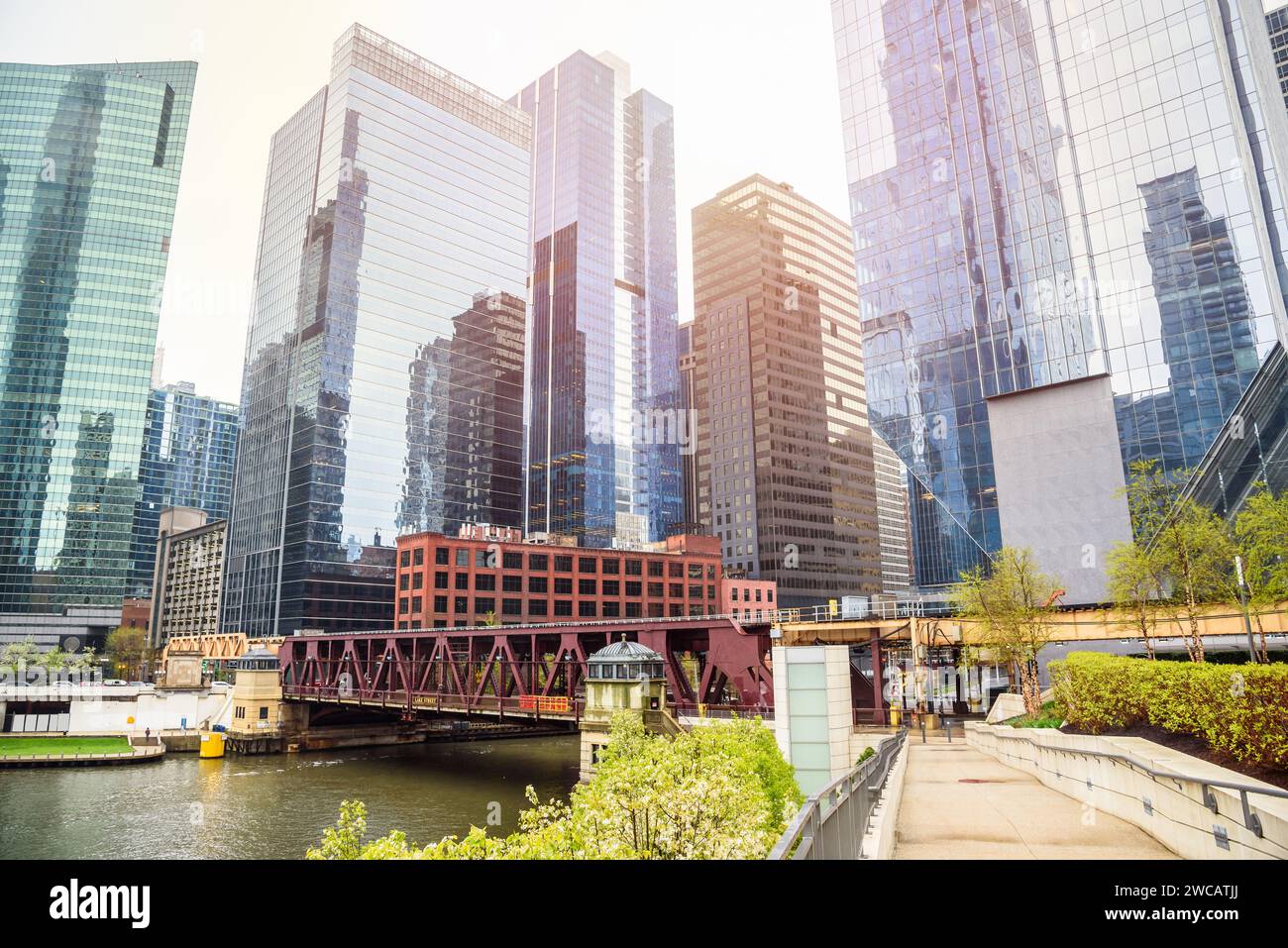 Chicago donwtown skyline as seen from a riverside path on a cloudy ...