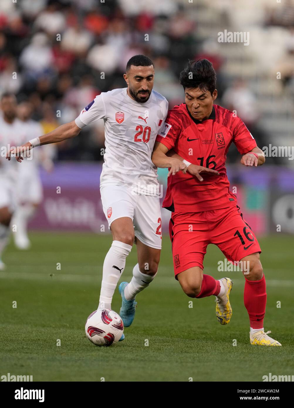 Bahrain's Mahdi Humaidan, left, and South Korea's Park Jin-seob vie for ...