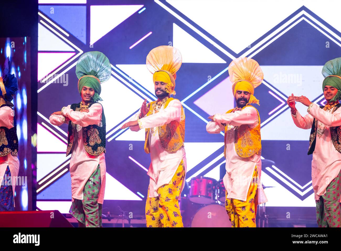 Group of punjabi artists from punjab performing bhangra dance in ...