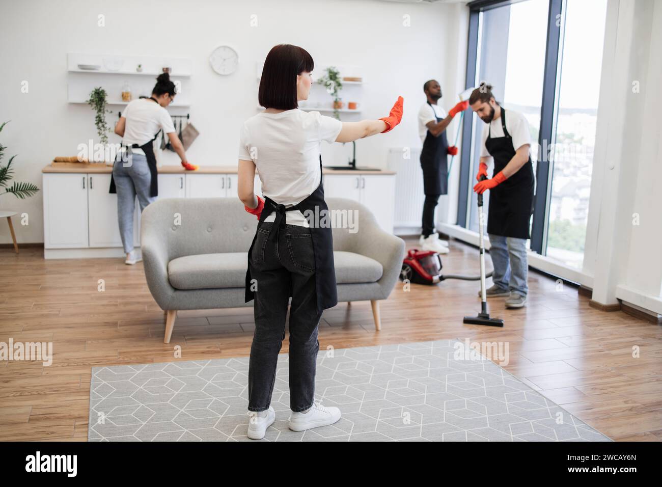 Professional housekeeper services company team working at customer ...