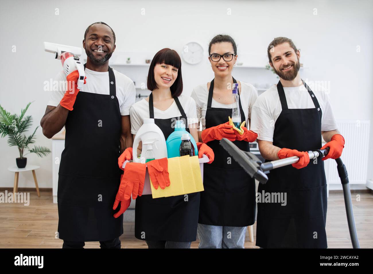 Group janitors cleaning equipment hi-res stock photography and images ...