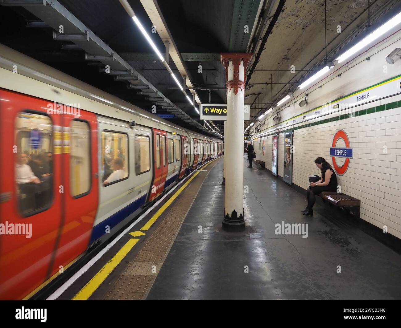LONDON, UK - JUNE 07, 2023: People At Temple Tube Station Stock Photo ...
