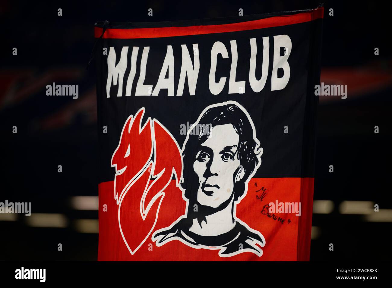Milan, Italy. 14 January 2024. A banner bearing hold crestoof AC Milan ...