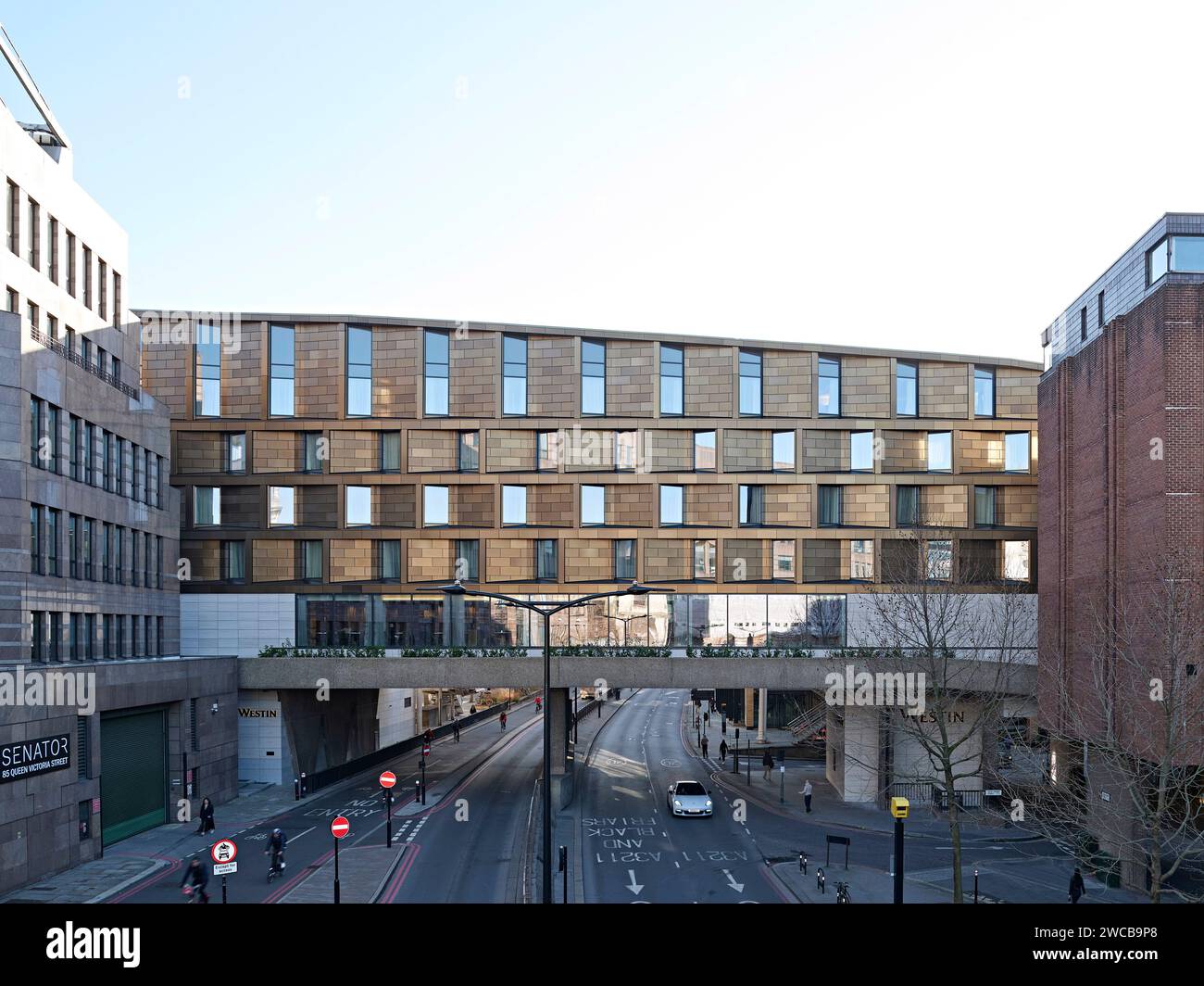 Building volume bridging city street and cycle path. The Westin London ...