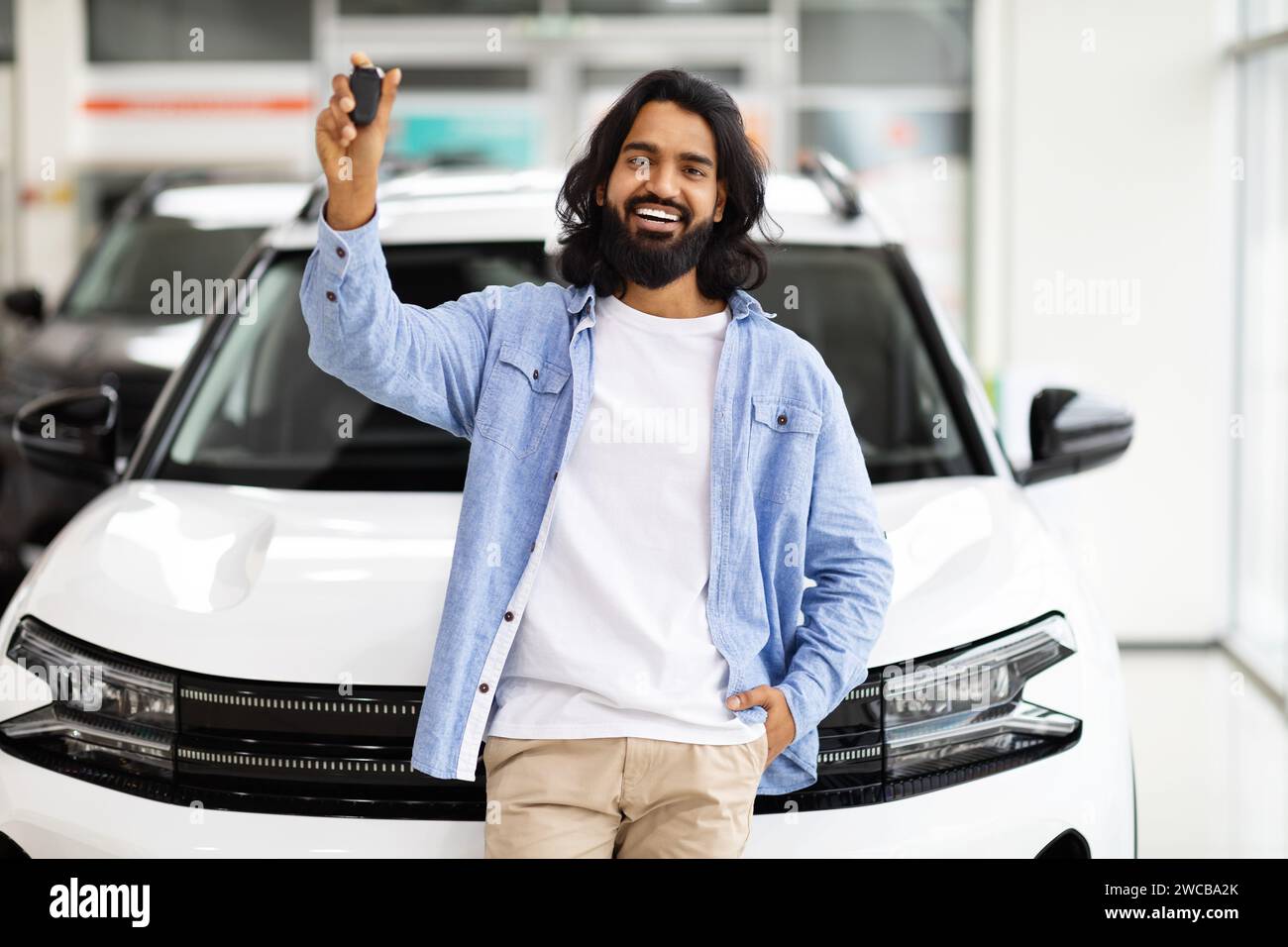 Guy raising hand hi-res stock photography and images - Alamy