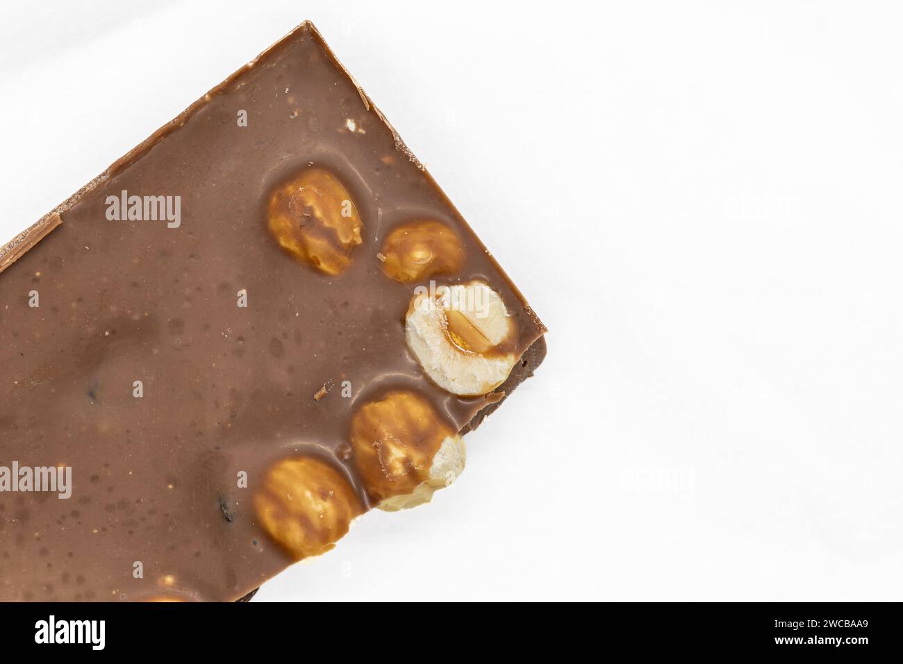 A delectable piece of chocolate placed elegantly on a pristine white ...