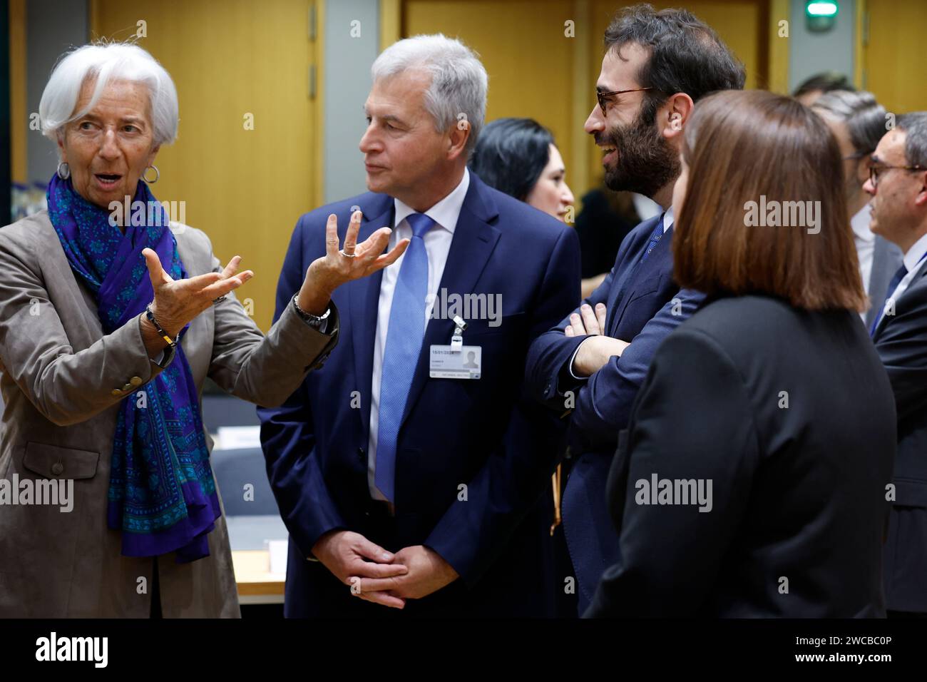 European Central Bank President Christine Lagarde, left, speaks with ...