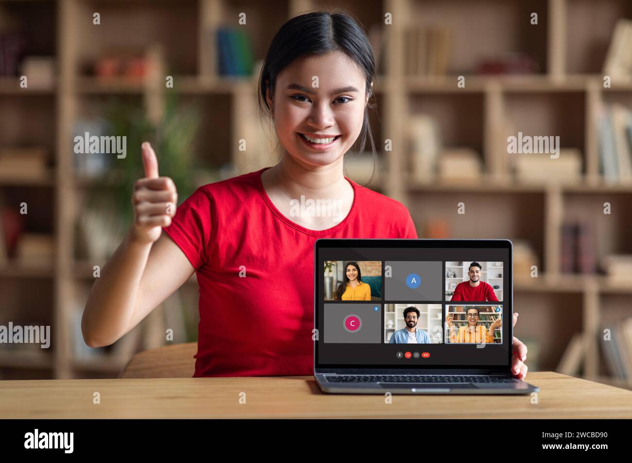 Young asian lady student recommending online course Stock Photo - Alamy