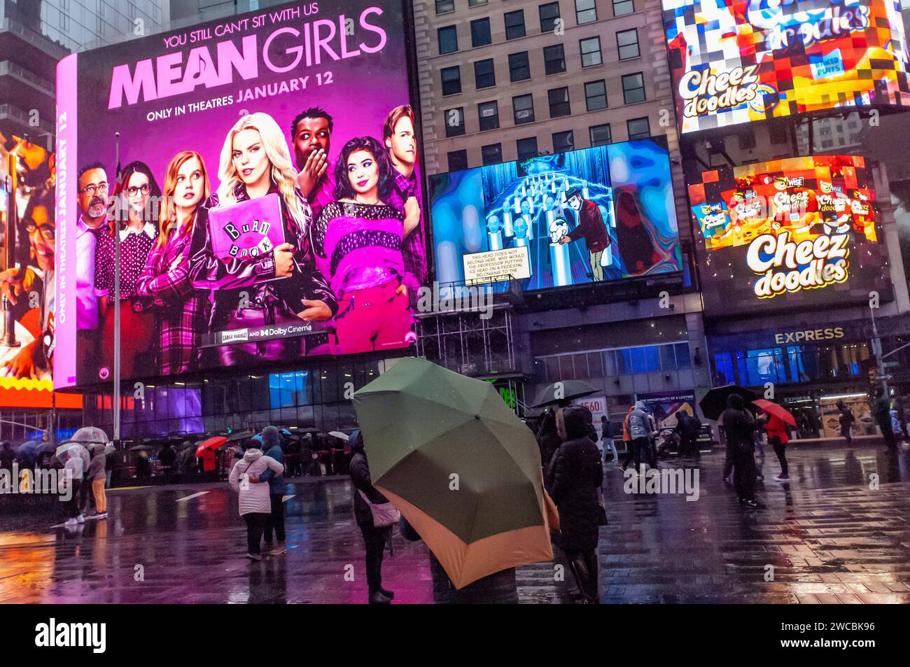 Visitors to Times Square on Sunday, January 7, 2024 contend with the ...