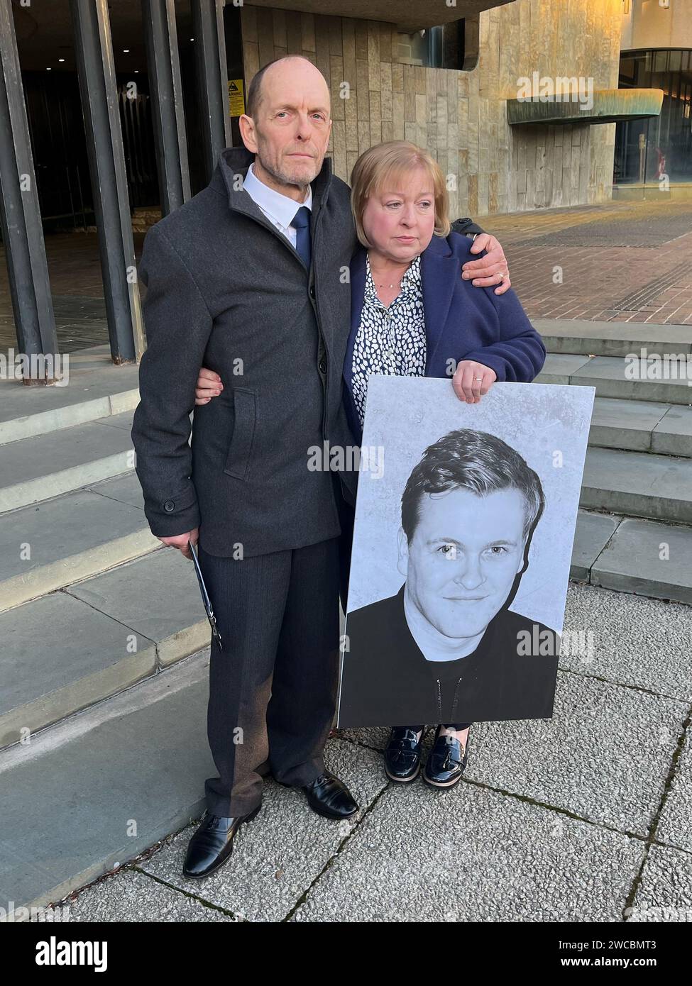Stuart and Jill Atkinson holding a photo of their son James Atkinson in ...