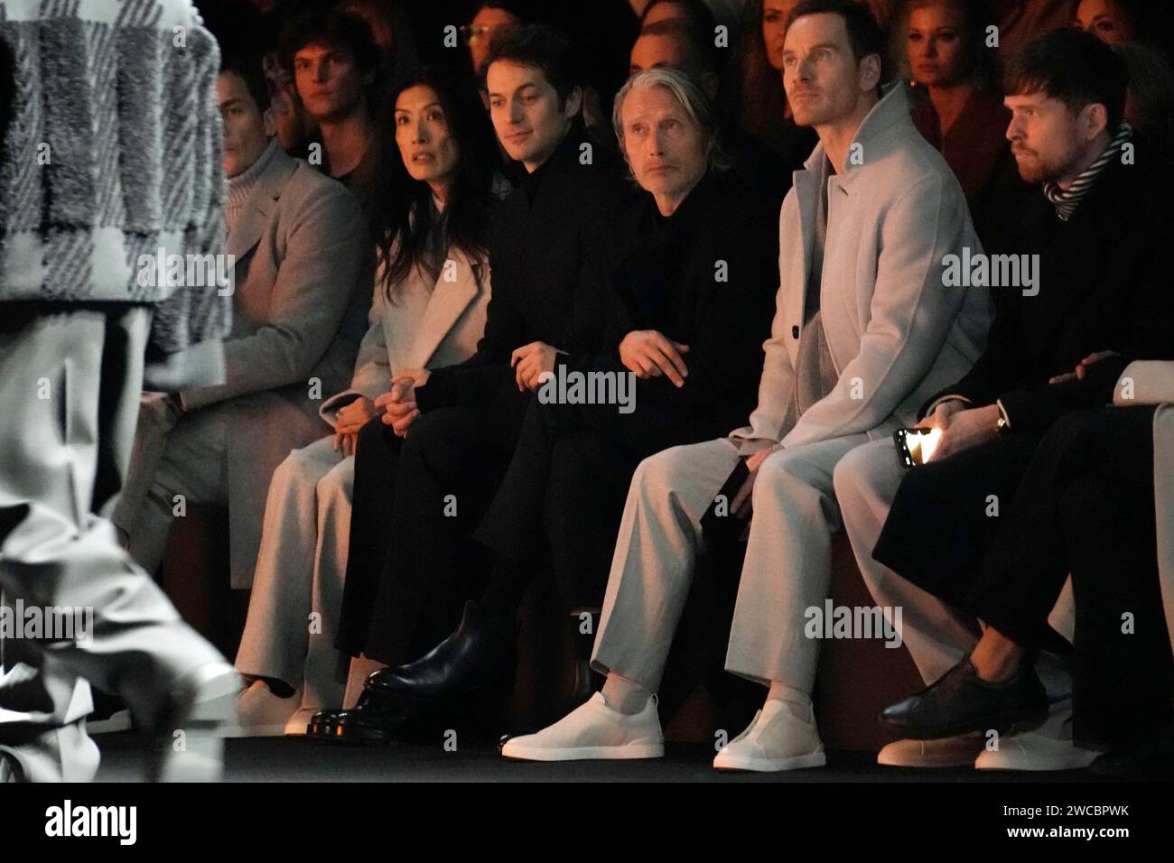 Danish actor Mads Mikkelsen, centre, attends the men's Zegna Fall ...