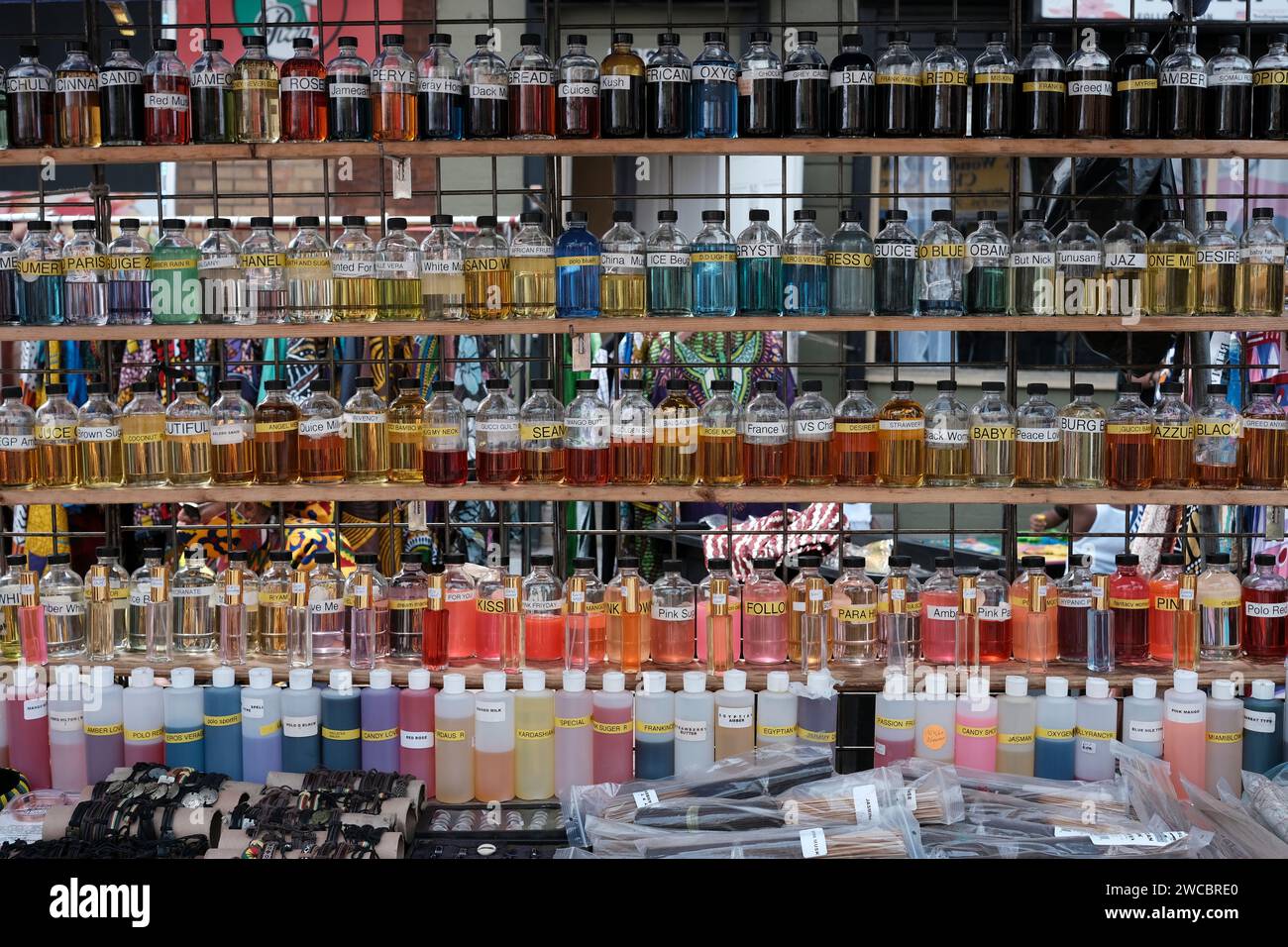 Colorful bottles of handmade perfumes, essential oils and beauty blends ...