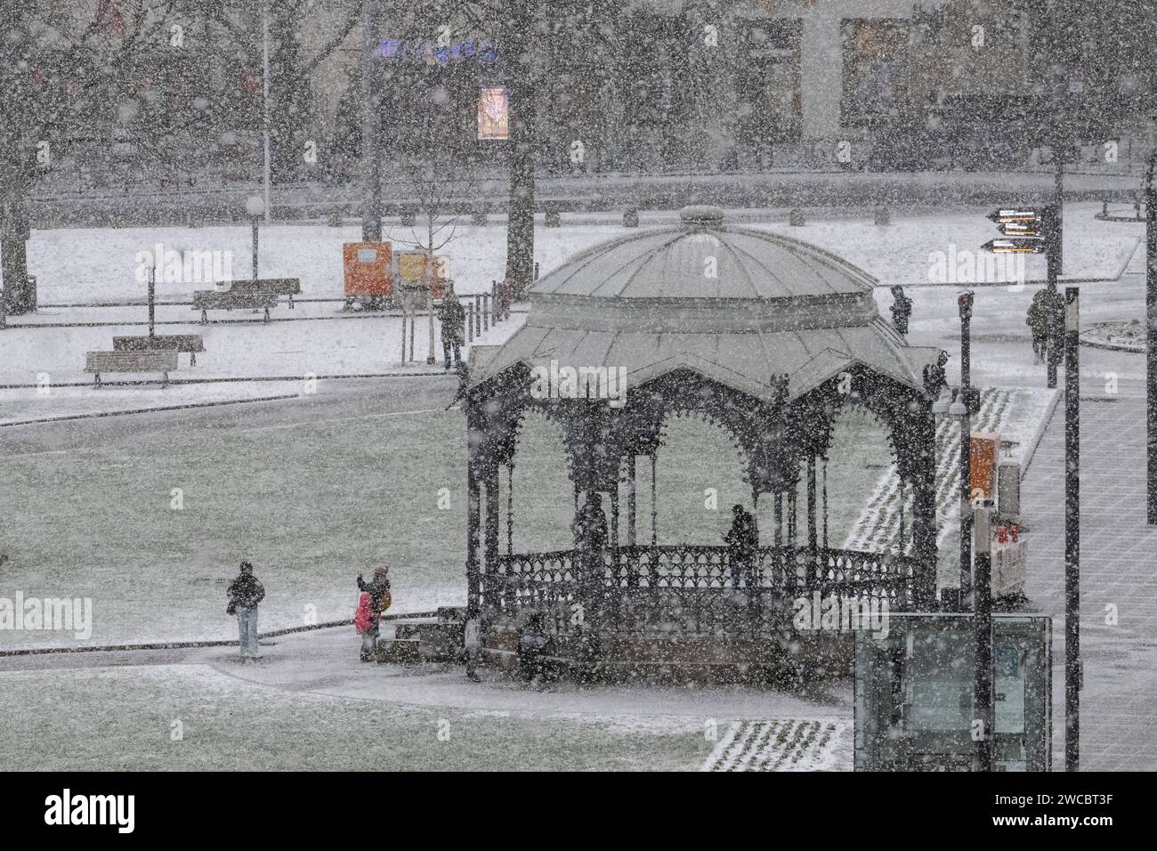 Stuttgart, Germany. 15th Jan, 2024. Snow flurries can be seen above the ...