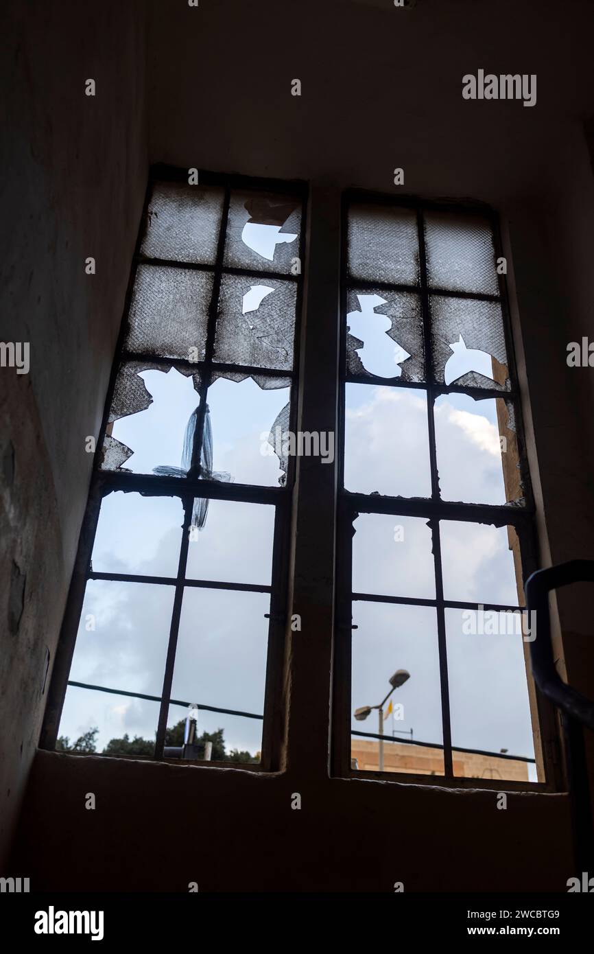 Broken window in an old house built in the constructivist style Stock ...