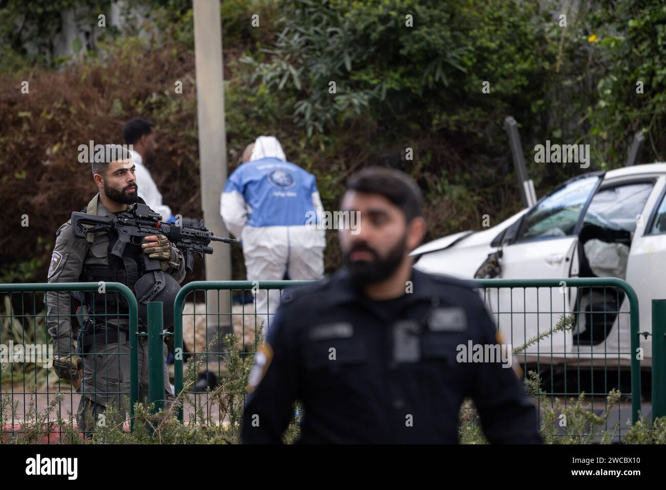 15 January 2024, Israel, Ra'anana: Israeli security officers are ...