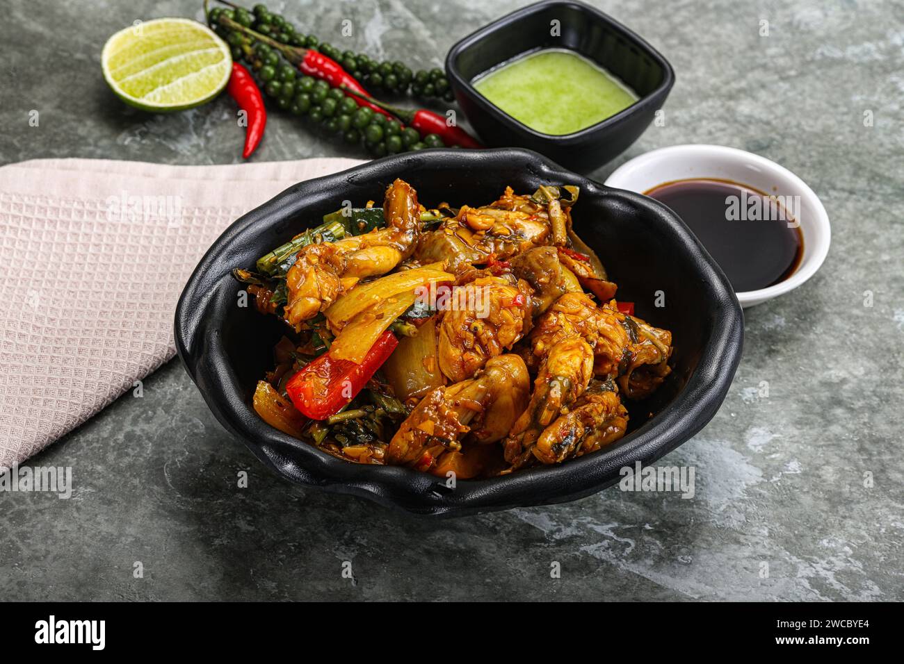 Vietnamese cuisine - fried frog with vegetables and spices Stock Photo ...