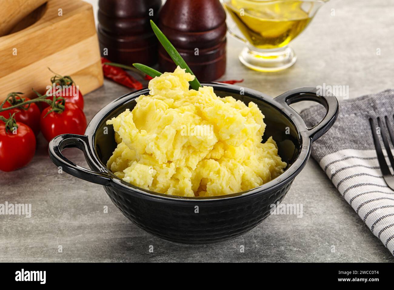 Mashed potato Puree with butter served green onion Stock Photo - Alamy