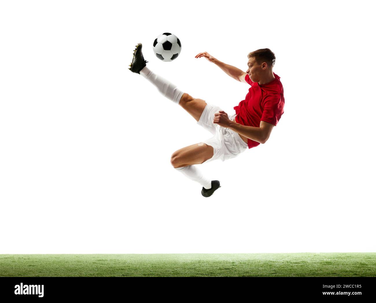 Precision meets flight. Dynamic portrait of a professional football player executing flawless ...
