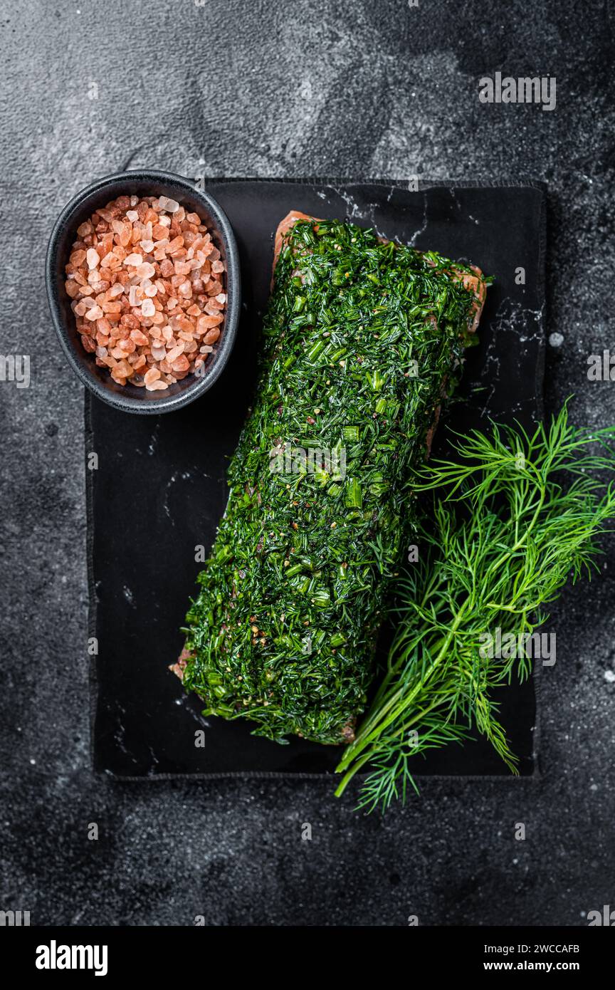 Nordic Gravlax Salmon fillet with dill. Black background. Top view ...