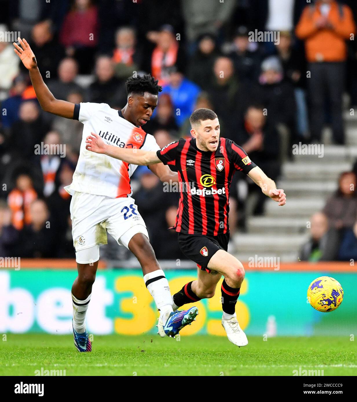 Albert Sambi Lokonga of Luton Town and Ryan Christie of AFC Bournemouth ...