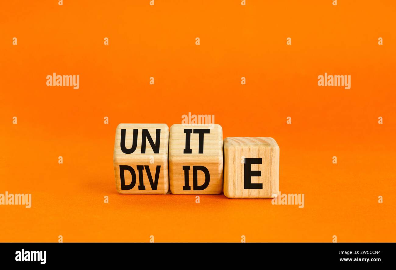 Unite or divide symbol. Concept word Unite or Divide on wooden cubes ...