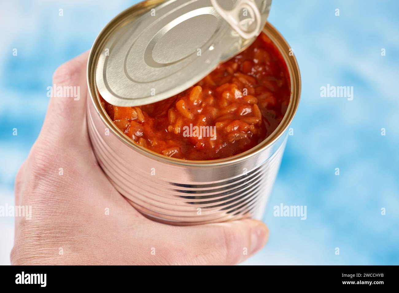 Mens hand in blue hi-res stock photography and images - Alamy