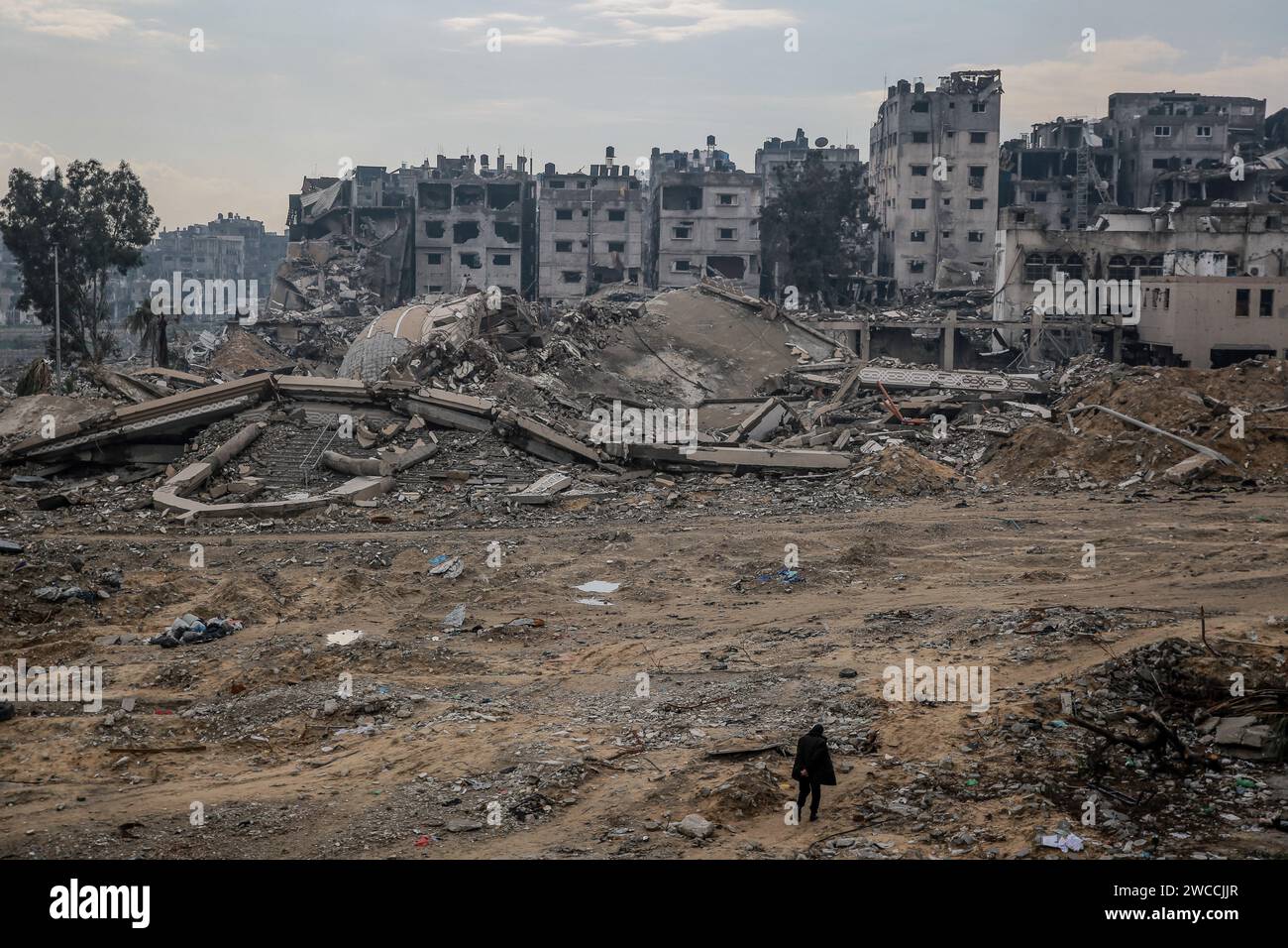Gaza City, Palestinian Territories. 15th Jan, 2024. Palestinians walk ...