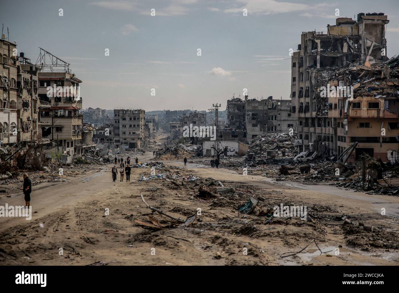 Gaza City, Palestinian Territories. 15th Jan, 2024. Palestinians walk ...